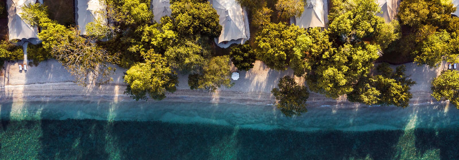 Amanwana | Fine Hotels + Resorts | Amex Travel